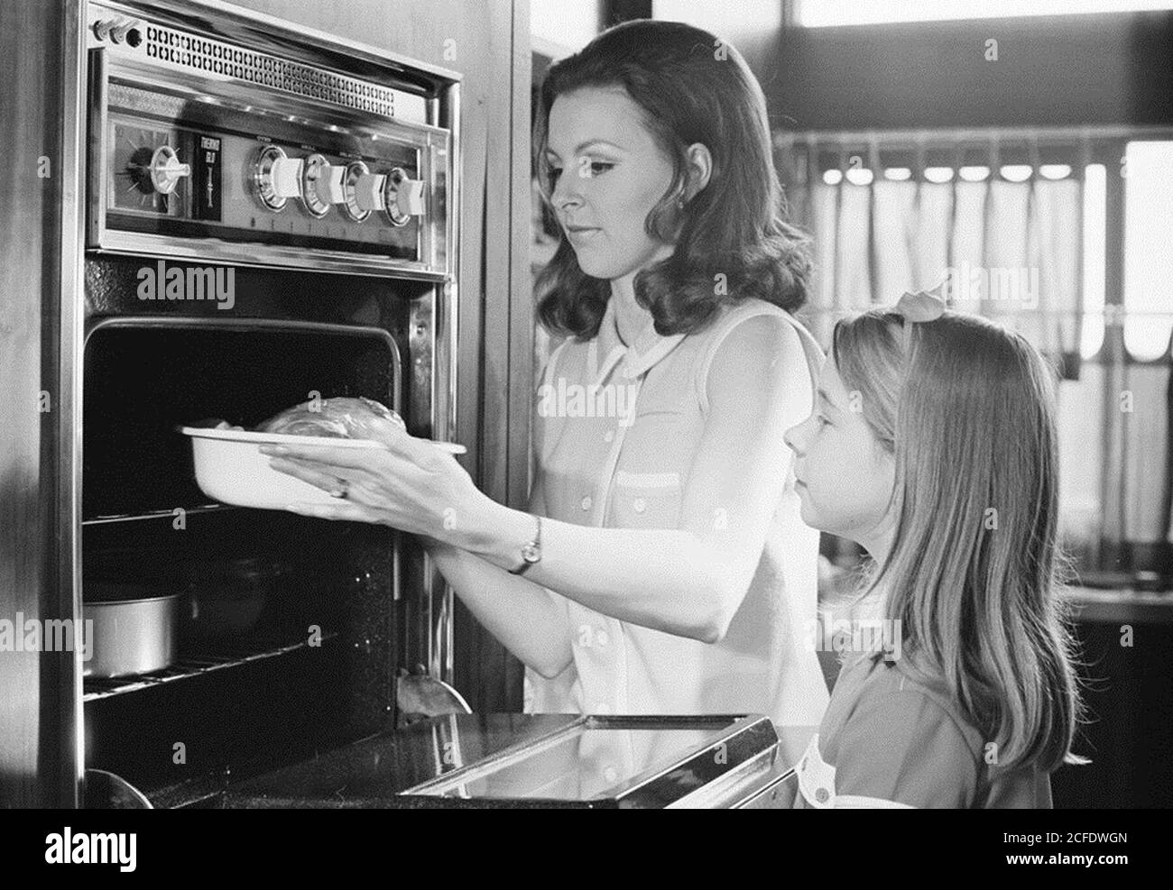 Retro Woman Cooking Black High Resolution Stock Photography and Images ...