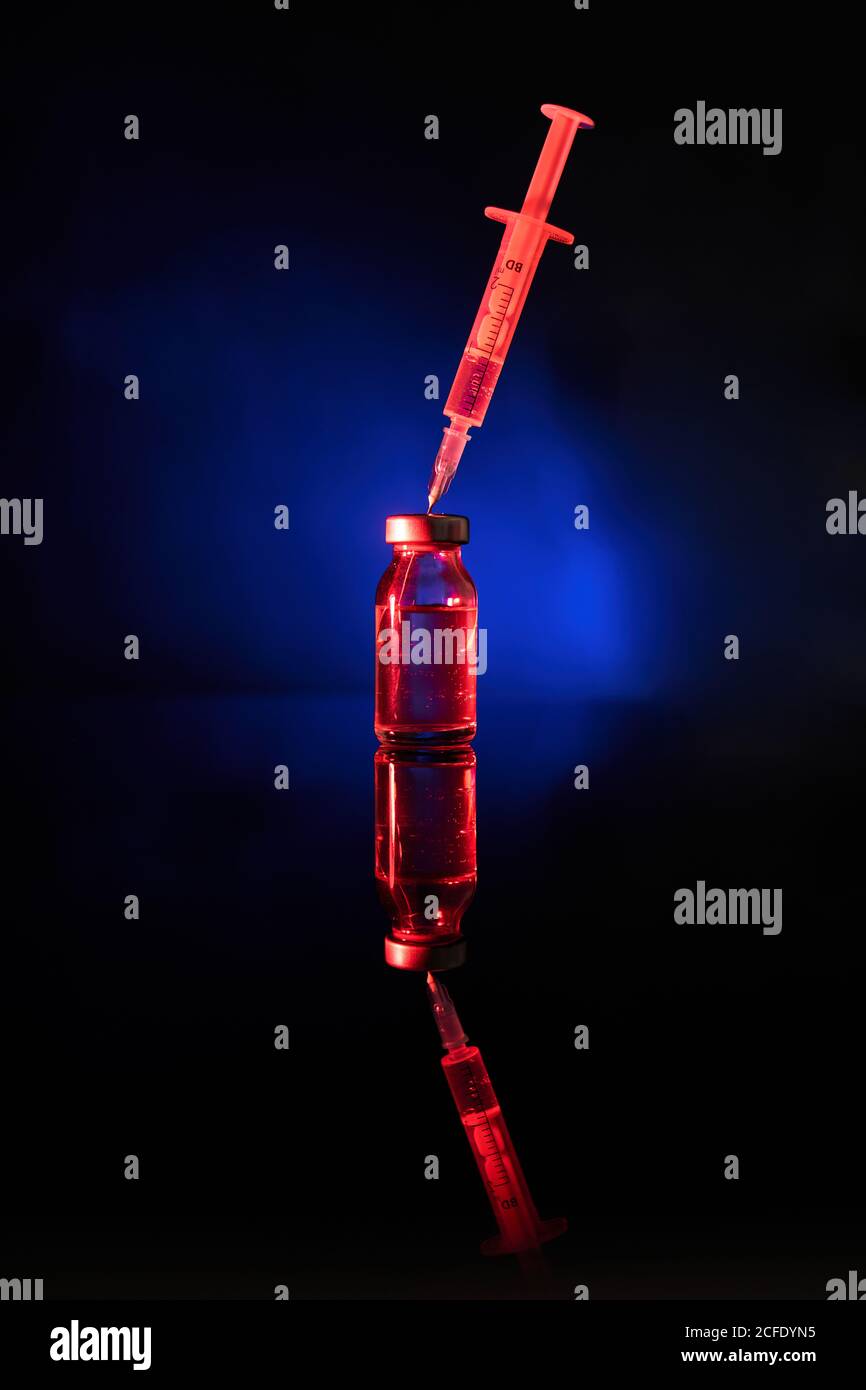 Injection needle syringe red fluid hi-res stock photography and images ...