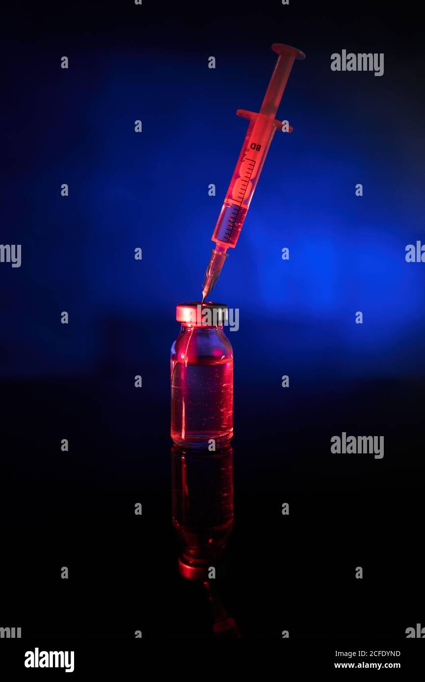 Injection needle syringe red fluid hi-res stock photography and images ...