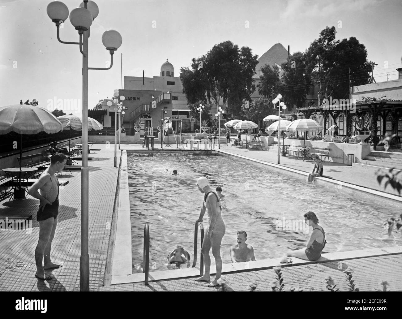 Original Caption: Egypt. Cairo. Hotels. Mena House. The swimming pool ...