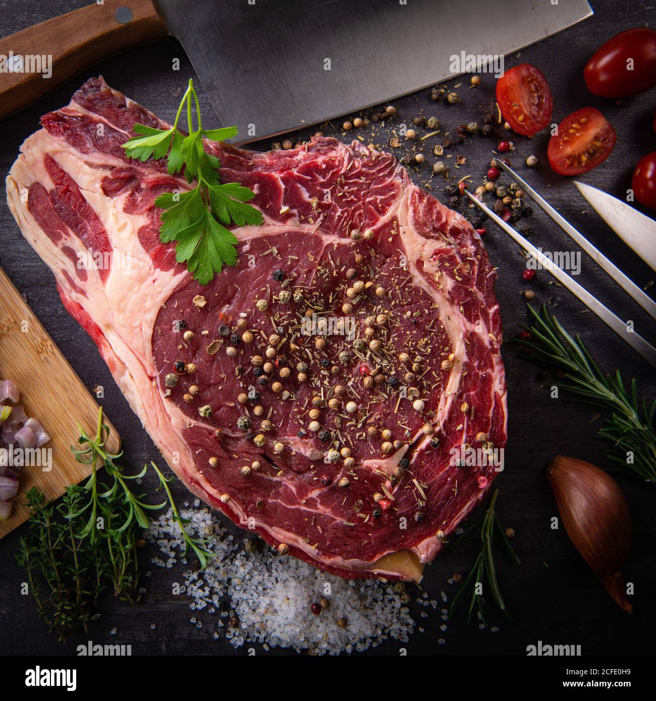 Raw T Bone steak entrecote prepared to Grill on turntable Stock Photo ...