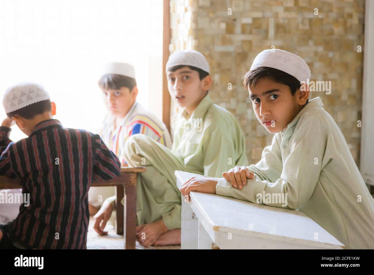 Boys studying in mosque, Masjid-e-Tooba, or Tooba Mosque, also Gol ... Boys studying in mosque, Masjid-e-Tooba, or Tooba Mosque, also Gol ...
