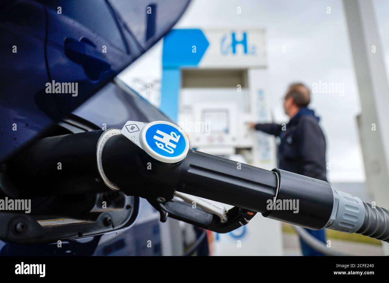 Hydrogen car refueling H2 hydrogen at a H2 hydrogen filling station ...