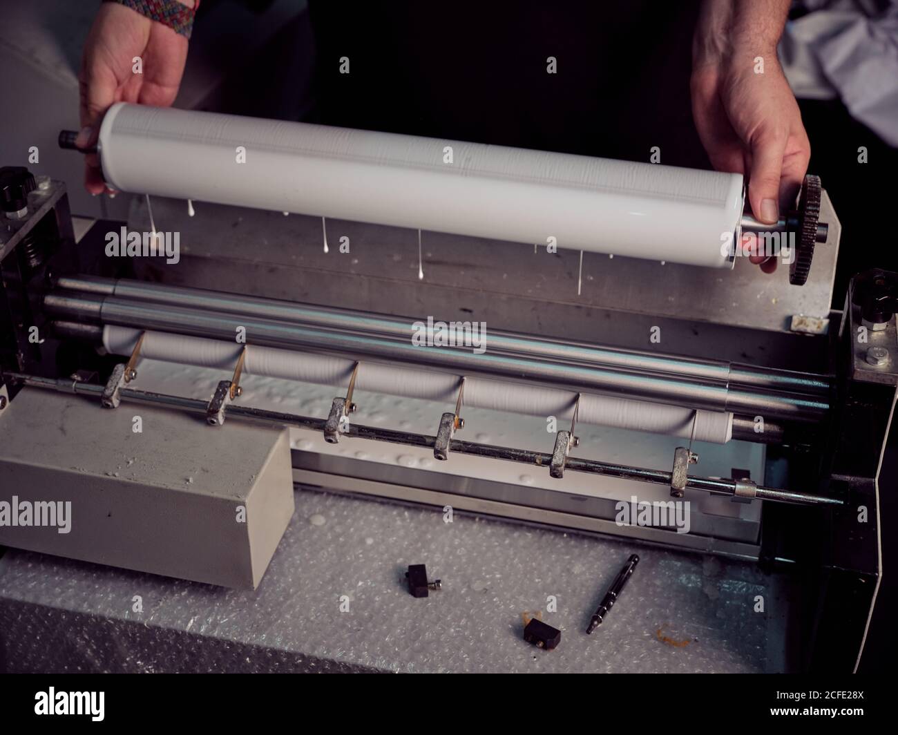 Gluing machine hi-res stock photography and images - Alamy