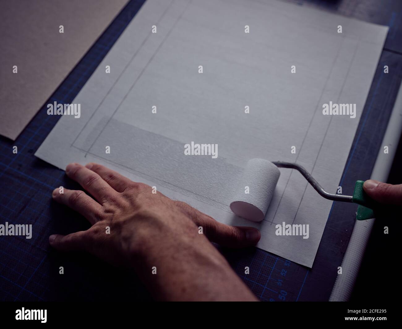 Gluing fabric hi-res stock photography and images - Alamy