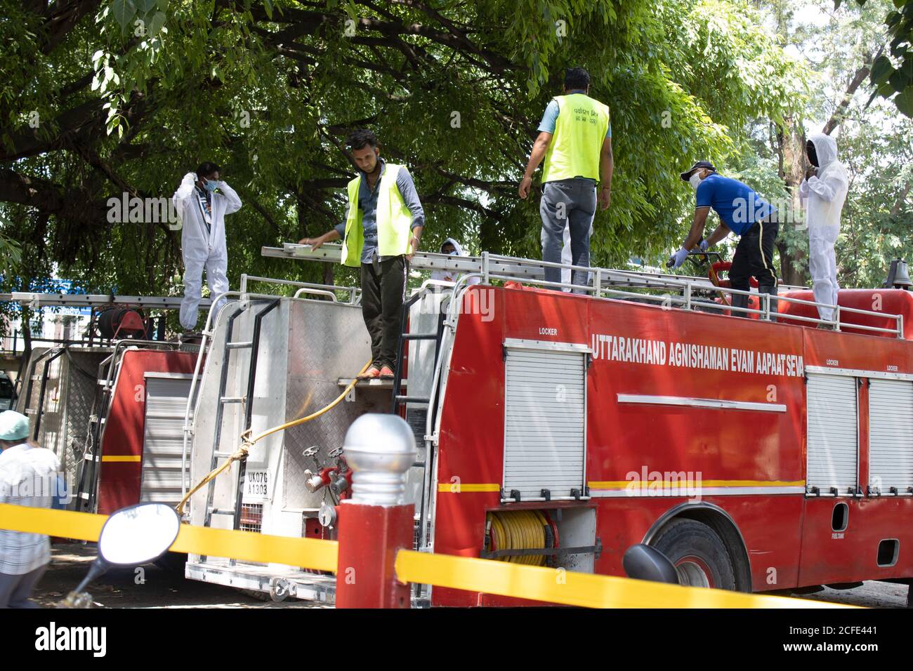 Dehradun, Uttarakhand/India- August 15 2020: policemen sanitizing ...