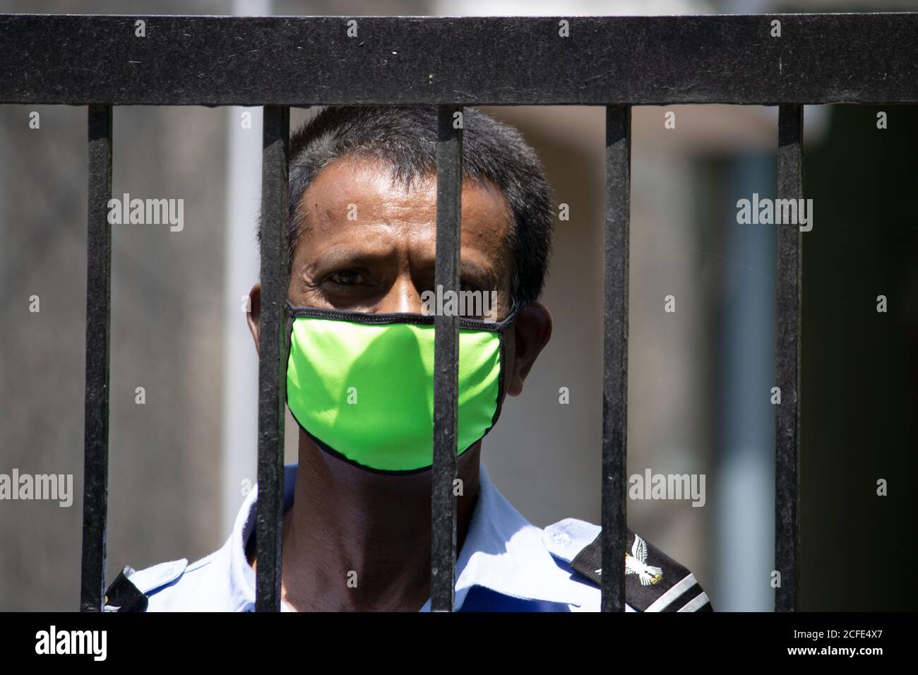 Security guard wearing face mask hi-res stock photography and images ...