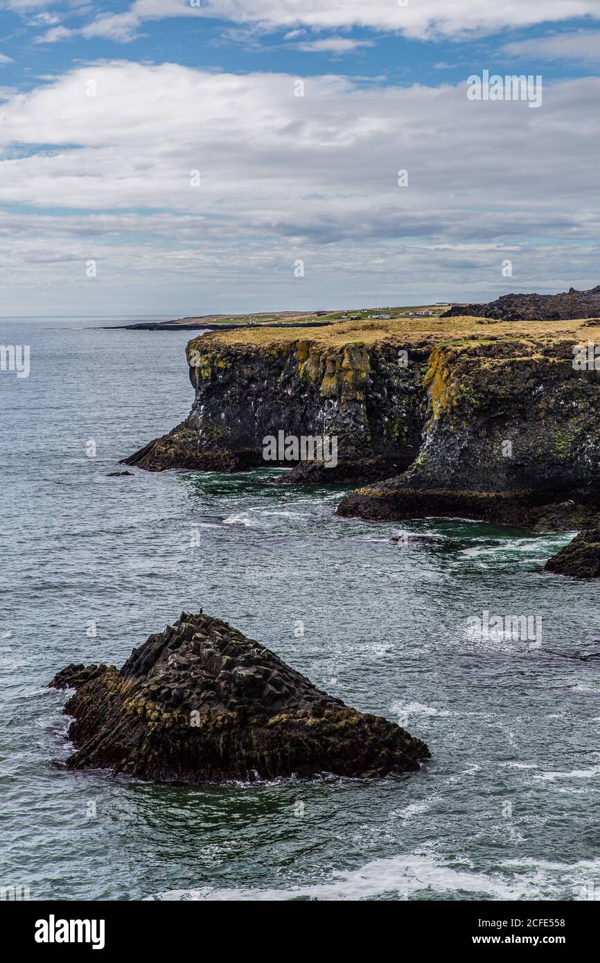 The basalt rock formation at the coast of Hellnar, Iceland Stock Photo ...