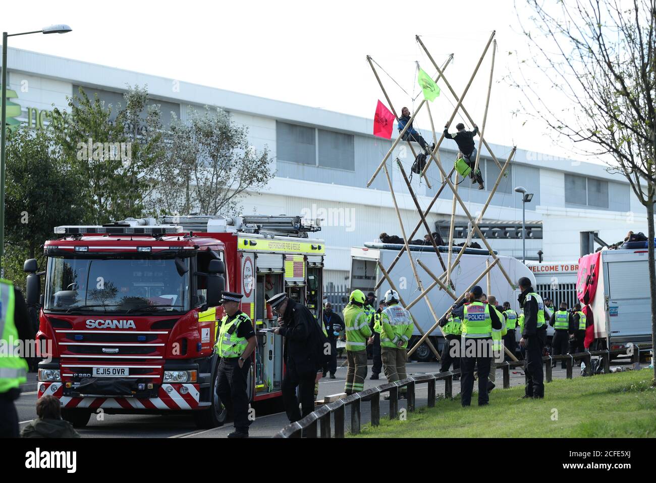 Protesters continue to use lock ons vans to block the road hi-res stock ...