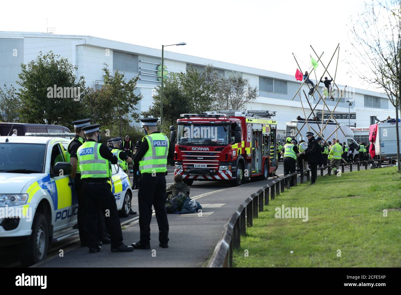 Protesters continue to use lock ons vans to block the road hi-res stock ...