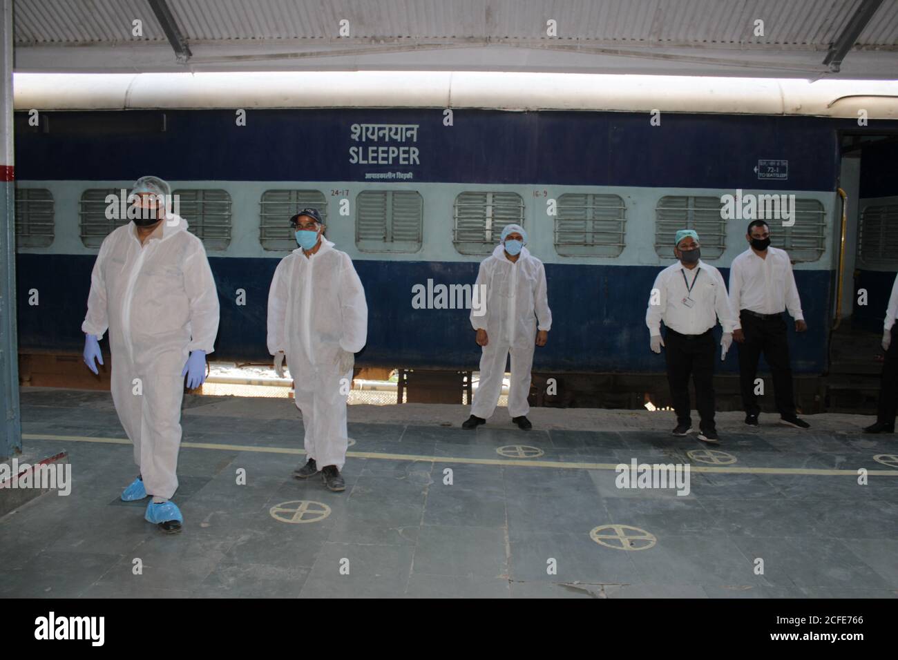 Police at work wearing mask and PPE kit Stock Photo - Alamy