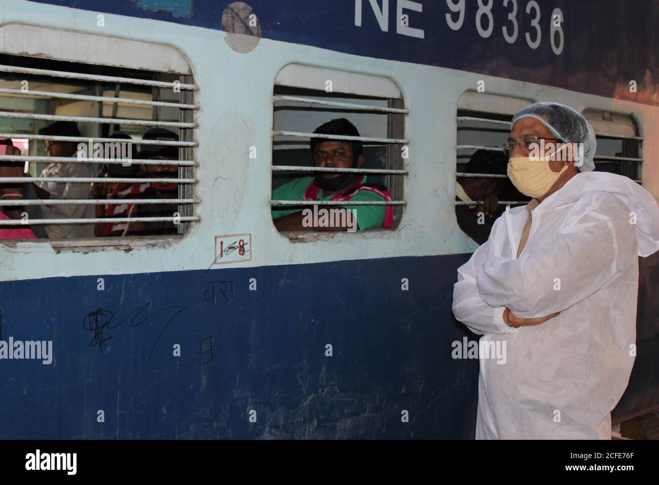 Police at work wearing mask and PPE kit Stock Photo - Alamy