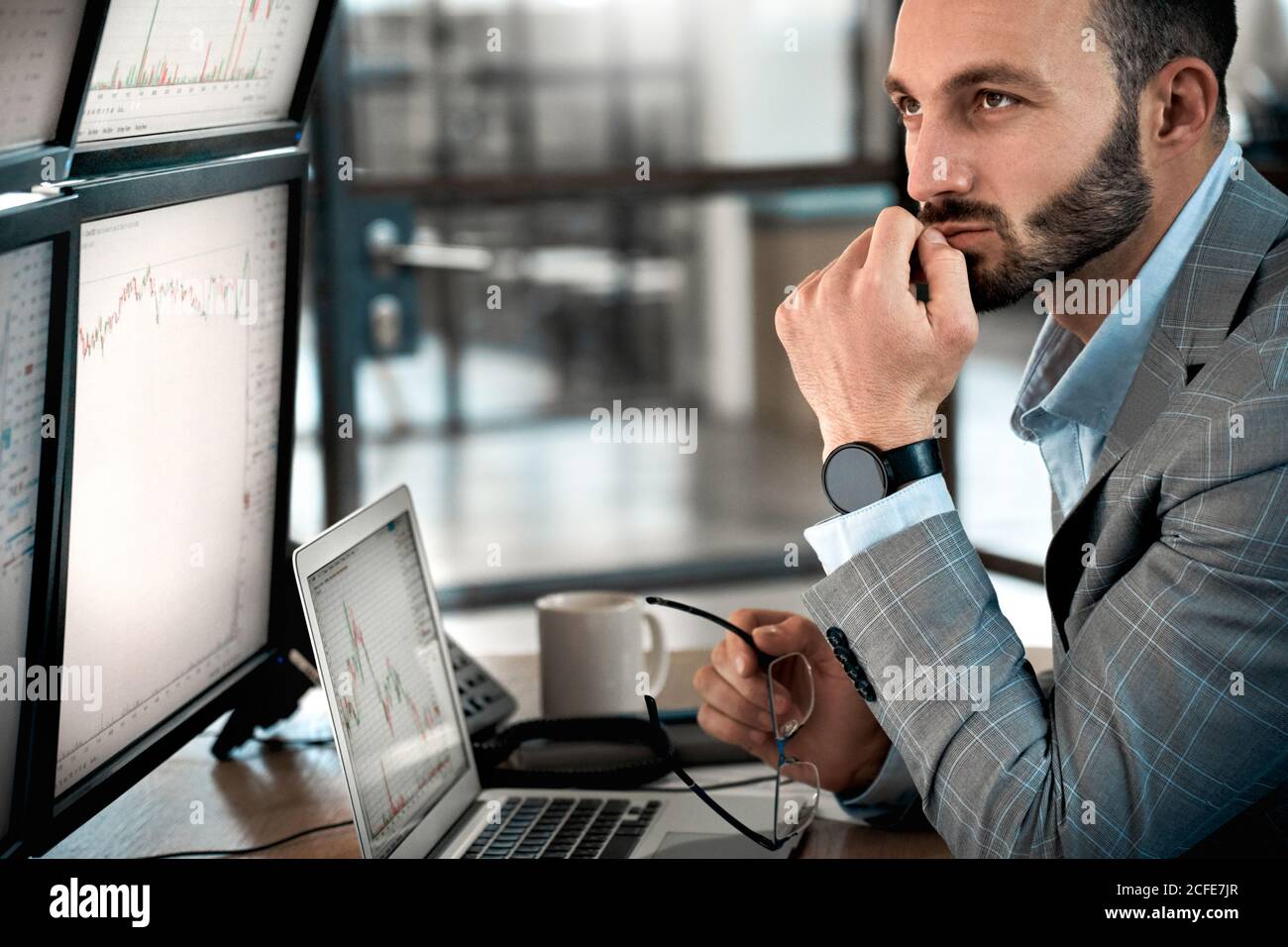 Stock trader analyzing stat and dynamic on forex charts Stock Photo - Alamy