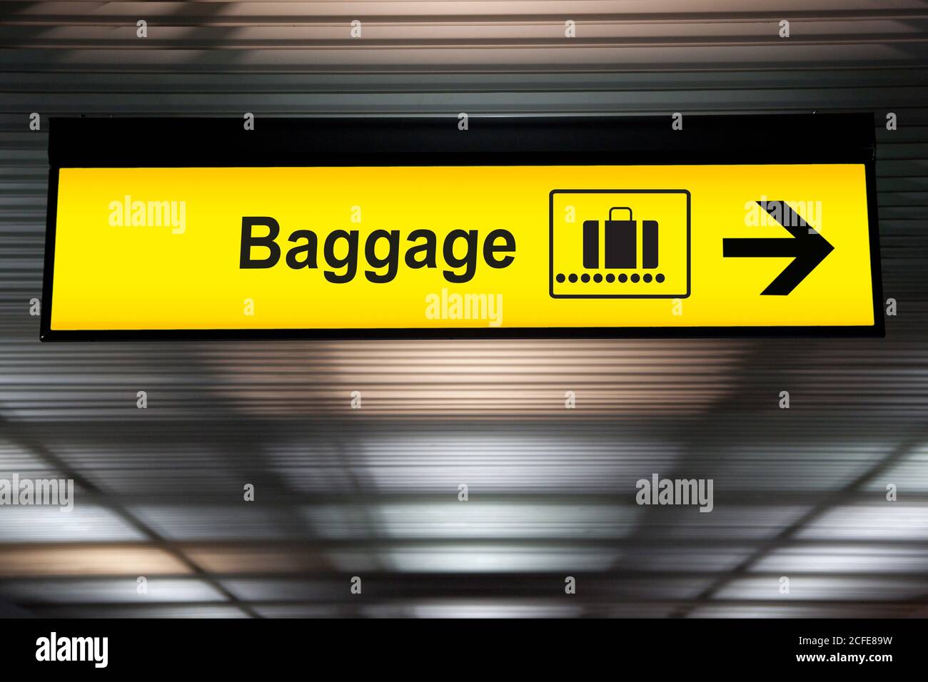 baggage airport signs hanging from ceiling from airport terminal Stock ...