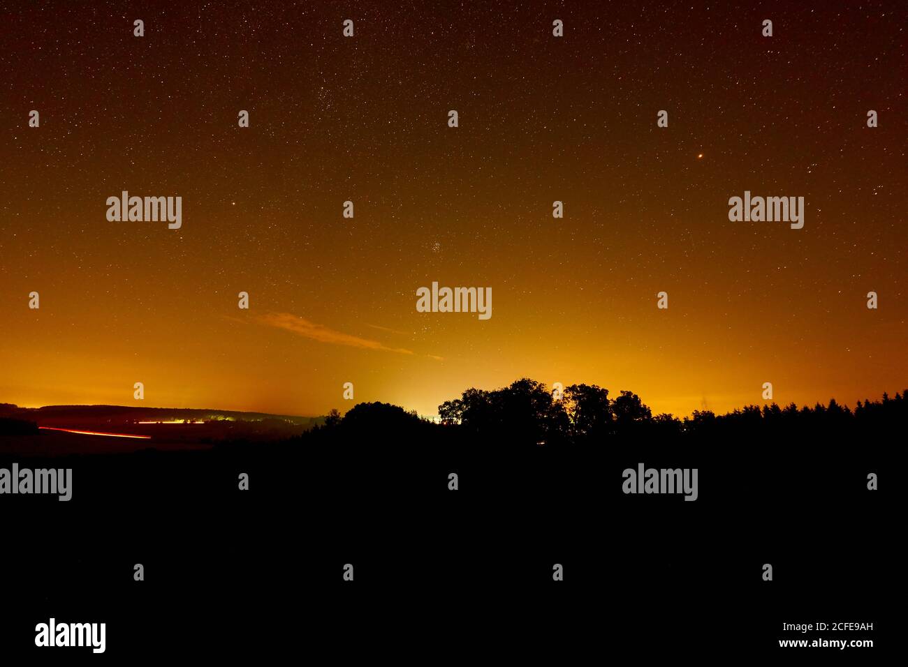 Orange night sky with many constellations, the planet Mars can be seen ...
