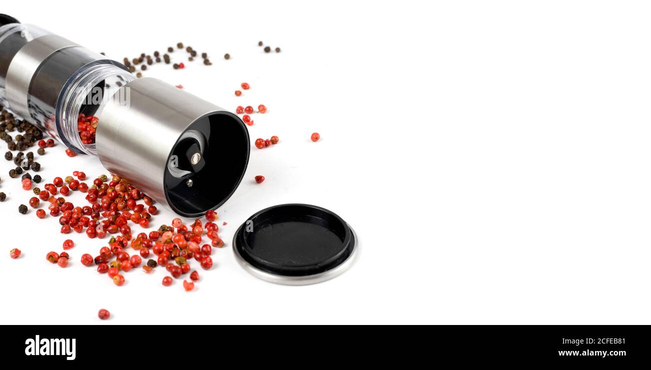 Pepper mill isolated on white background Stock Photo - Alamy