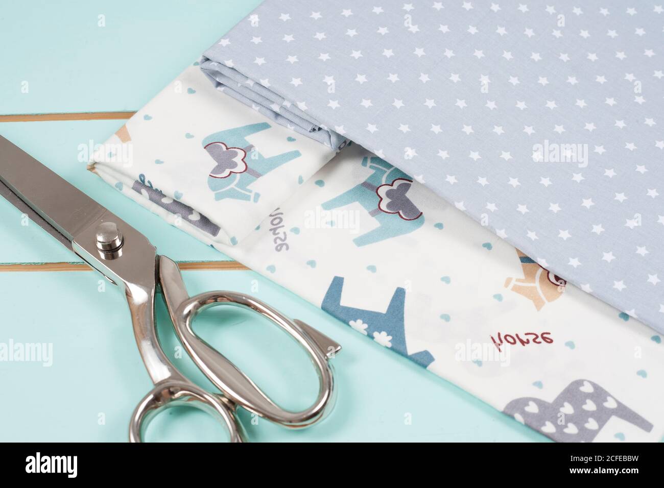 Dressmaking or tailoring scissors on cotton fabric Stock Photo - Alamy