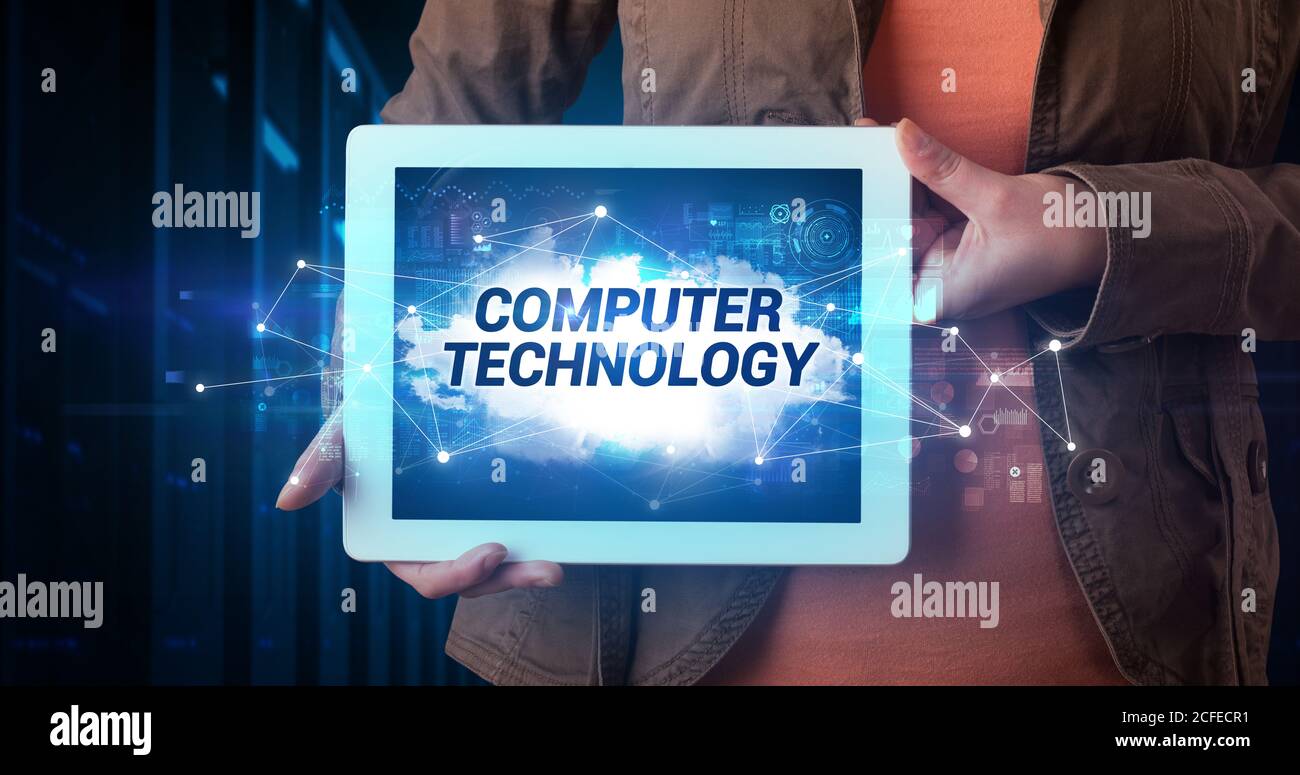 Young business person working on tablet and shows the inscription ...