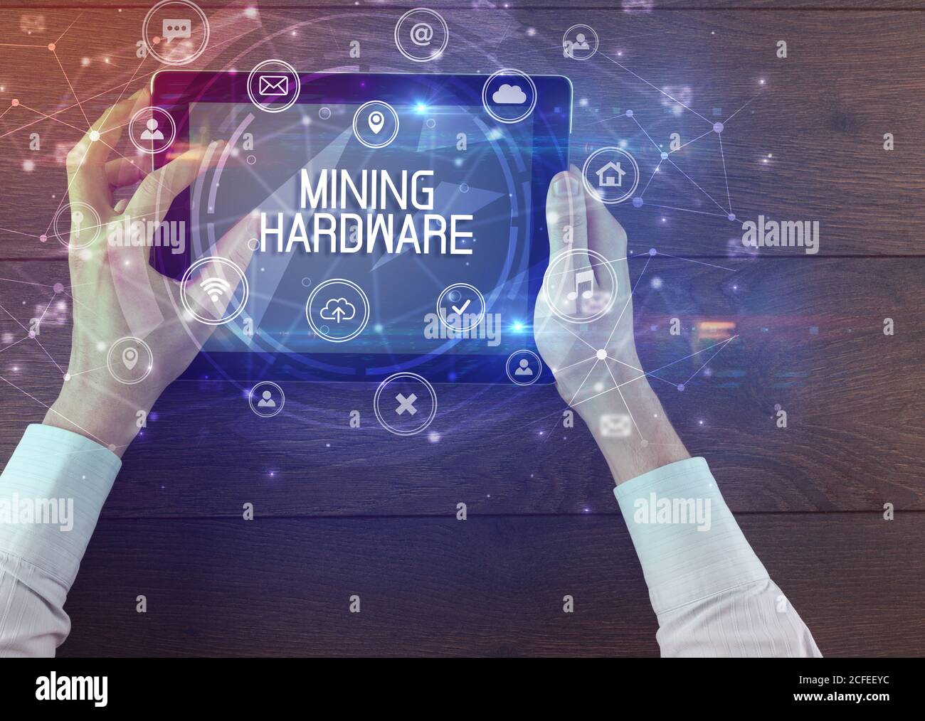 Close-up of a tablet with MINING HARDWARE inscription, innovative ...