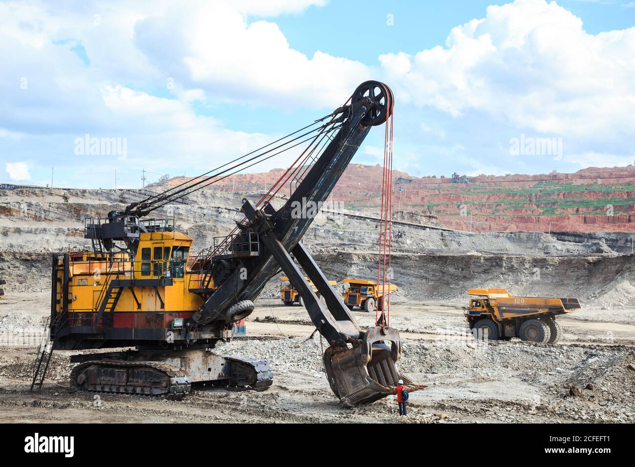 Mine heavy equipment working in the site. The machine are very big ...