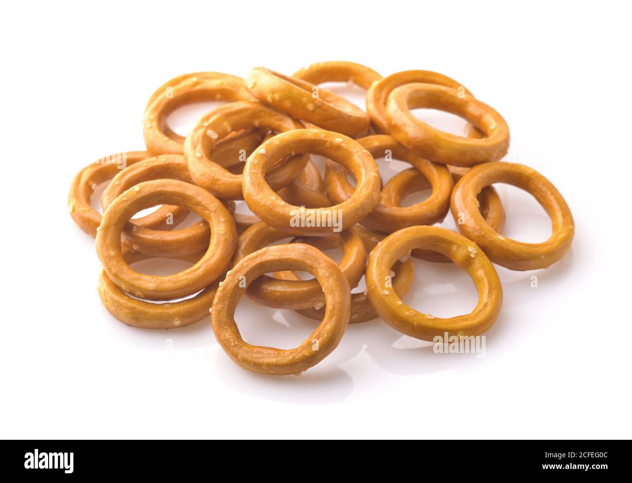 Pile of mini salted crispbread rings isolated on white Stock Photo - Alamy