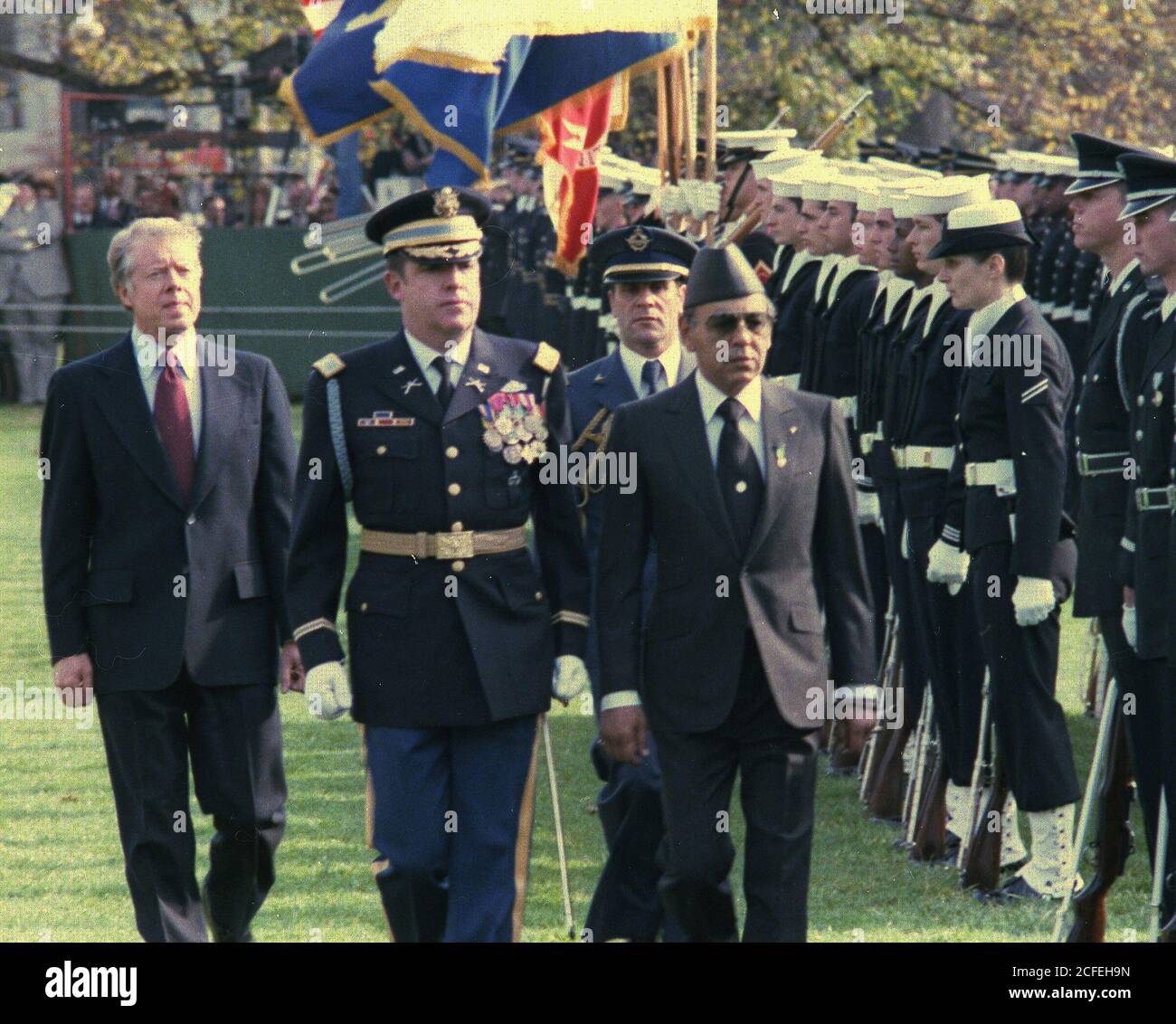Jimmy Carter and King Hassan II review troops during arrival ceremony ...
