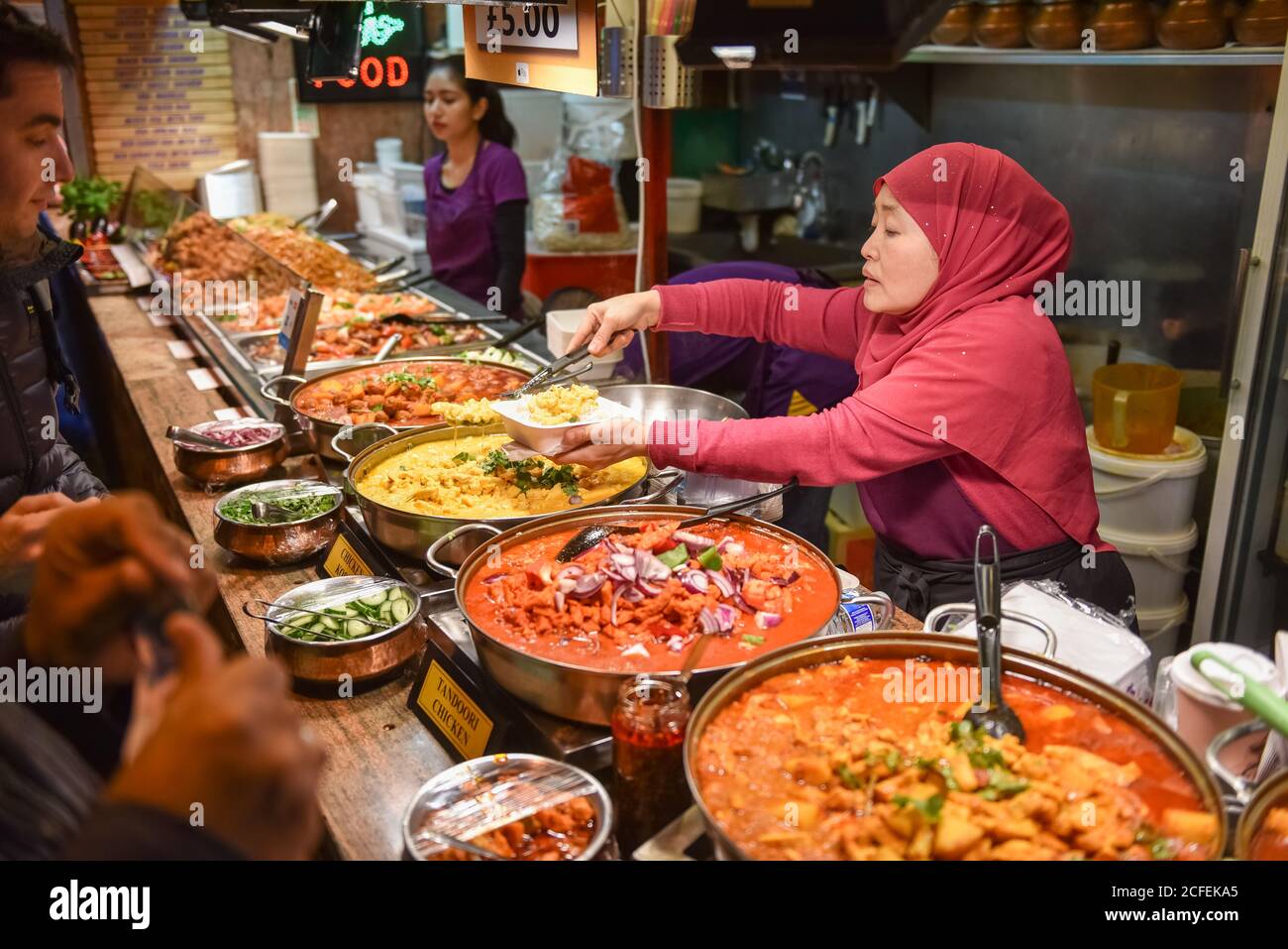 LONDON, ENGLAND - APRIL 07, 2017: Chinese chefs serve delicious food ...