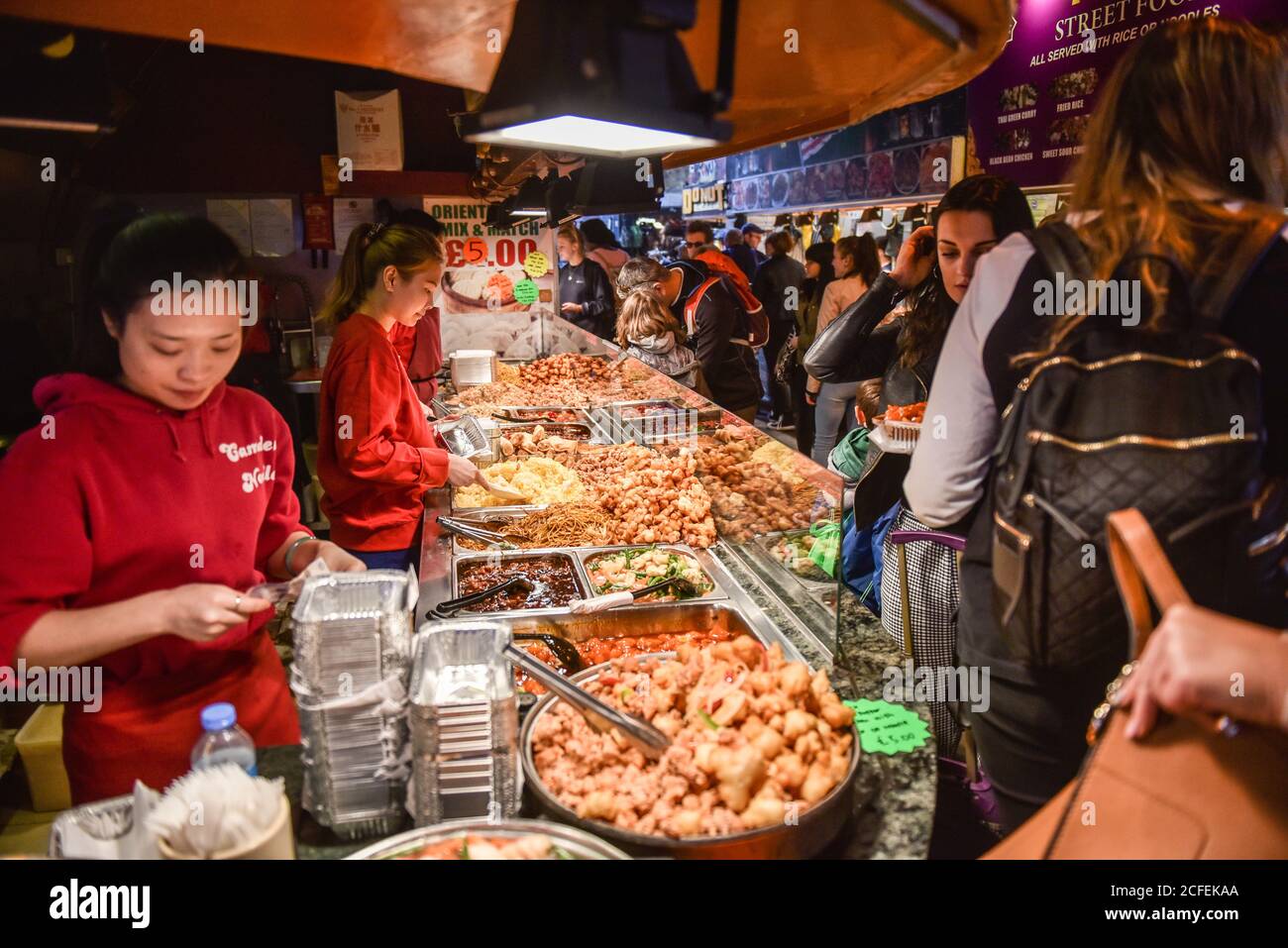 LONDON, ENGLAND - APRIL 07, 2017: Chinese chefs serve delicious food ...