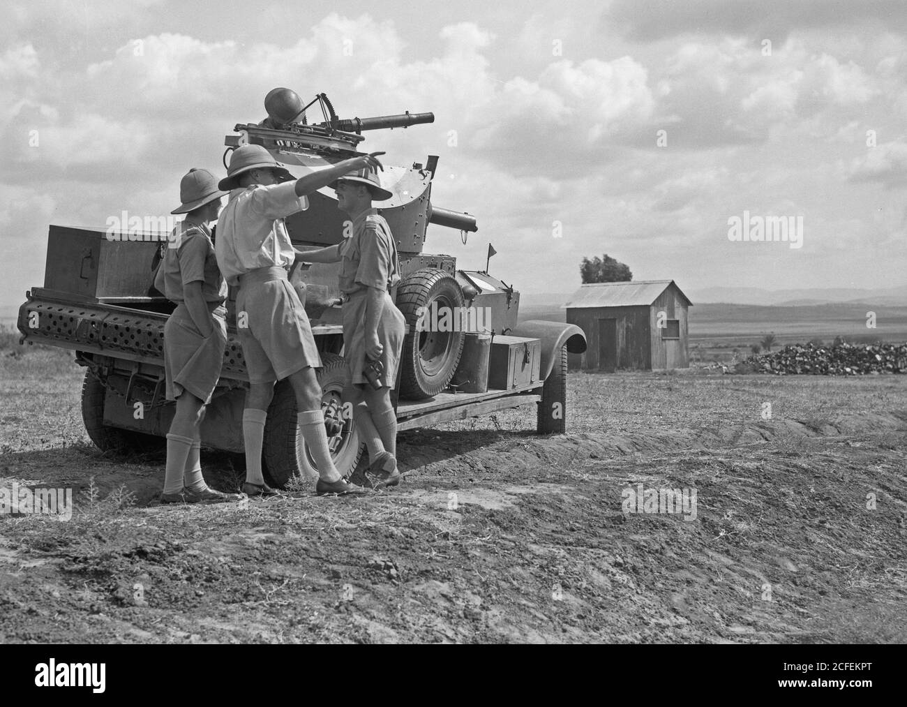 Middle East History - R.A.F. activities. Armoured car officer giving ...