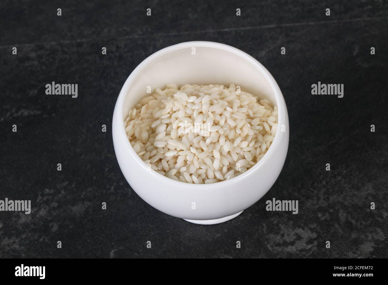 Raw Arborio rice for Italian risotto Stock Photo - Alamy