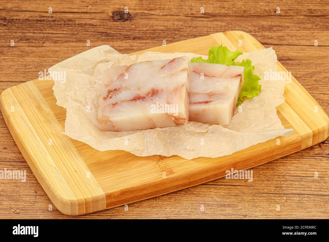 Raw dietary pollock fish fillet for cooking Stock Photo - Alamy