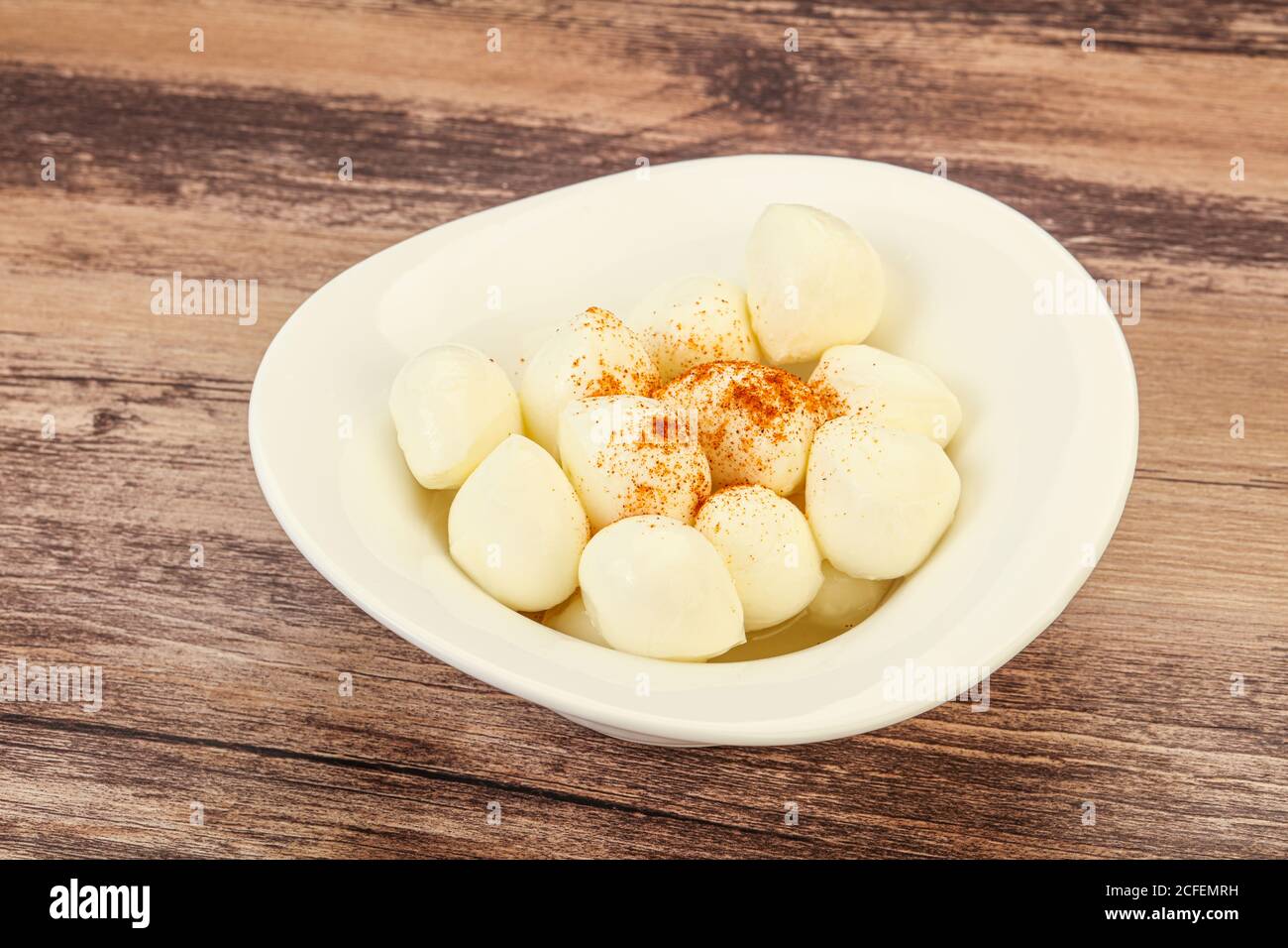 Natural tasty baby Mozarella cheese in the bowl Stock Photo - Alamy