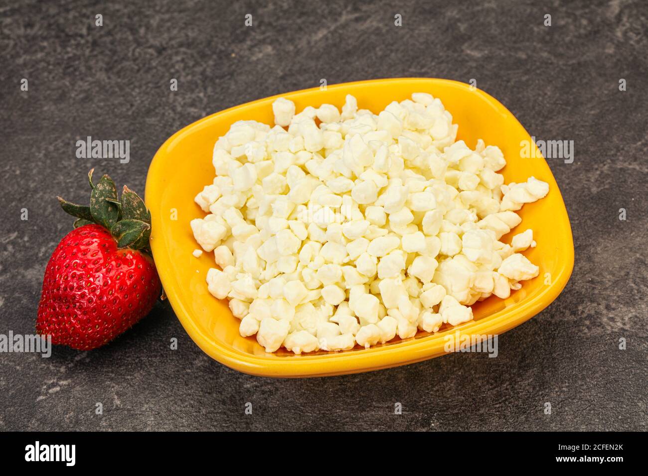 Dietary food - grain cottage cheese in the bowl Stock Photo - Alamy