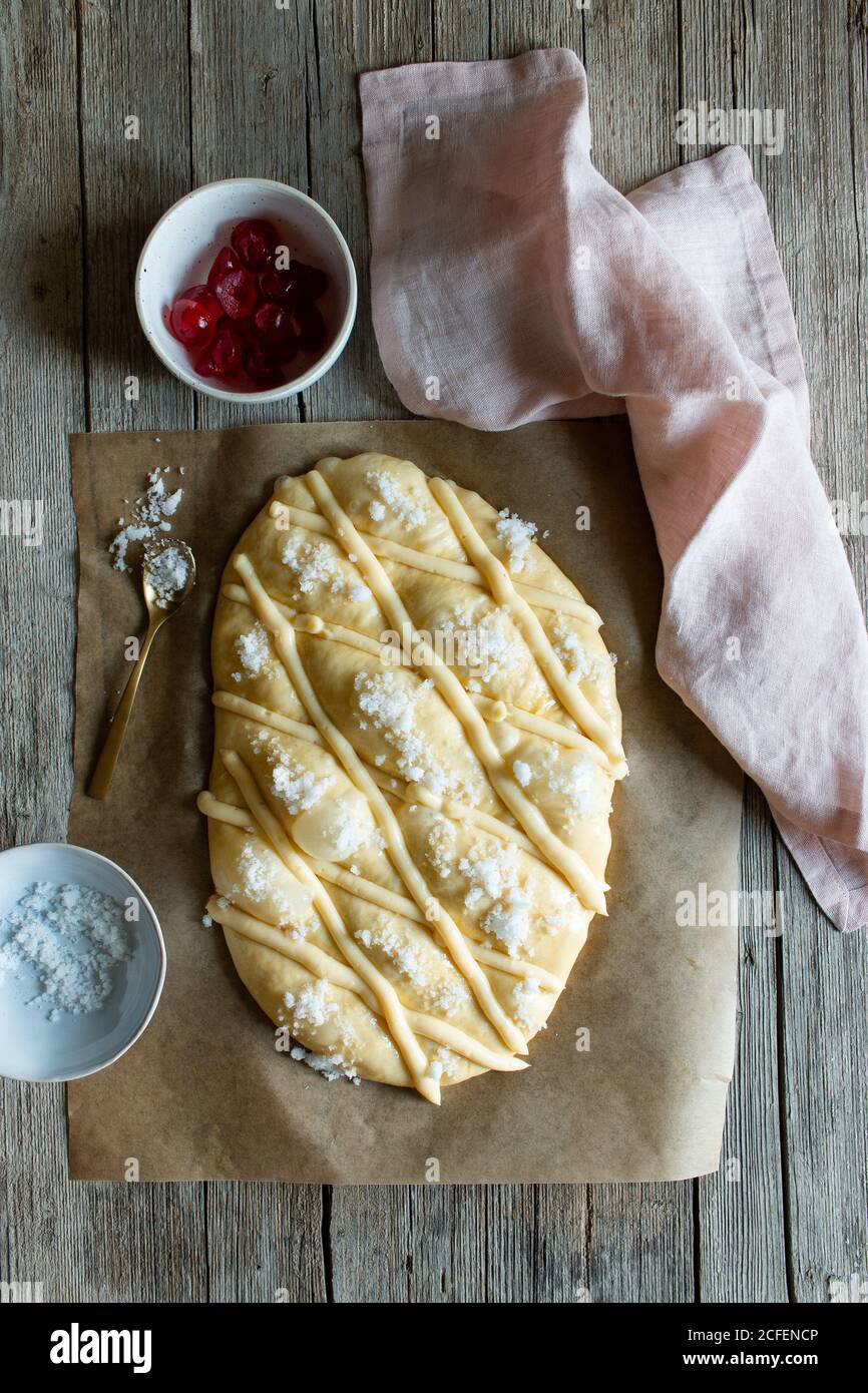 Top view of fresh Coca de San Juan pastry on timber table in rustic ...