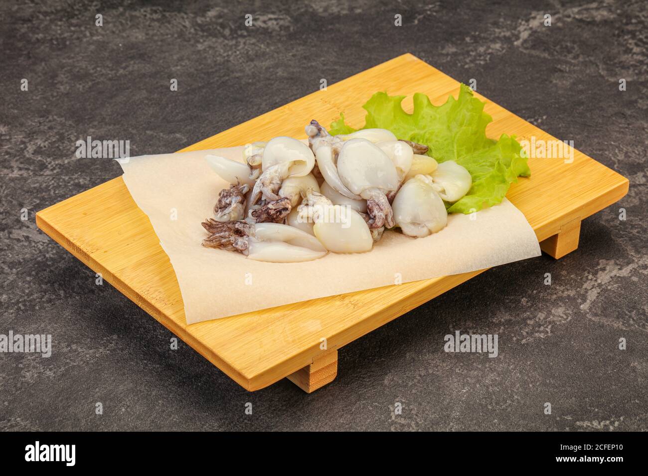 Raw seafood - cuttlefish for cooking over board Stock Photo - Alamy