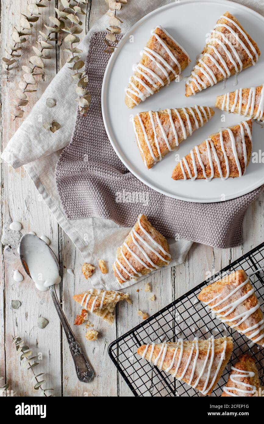 Top view of tasty sweet homemade triangle scones decorated with sugar ...