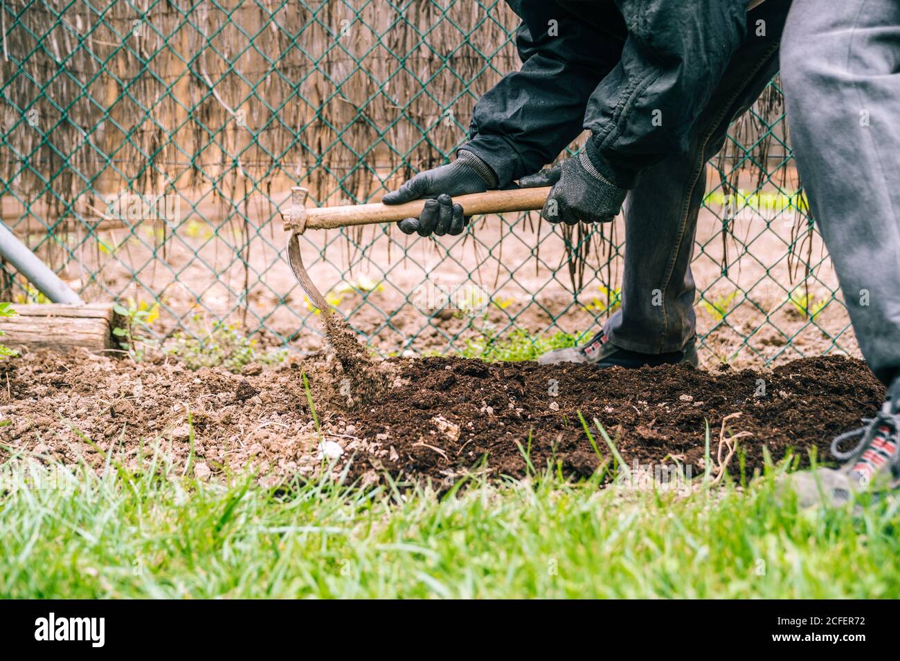 Adult man farmer rake hi-res stock photography and images - Alamy