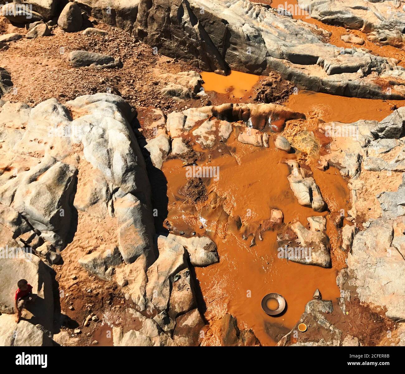 Artisanal gold mining near Antsirabe, Madagascar. Panners wash ...