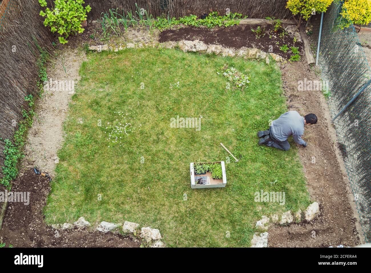 Adult man farmer rake hi-res stock photography and images - Alamy