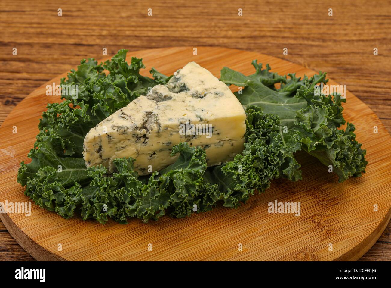 Dairy Blue cheese triangle with mold Stock Photo - Alamy
