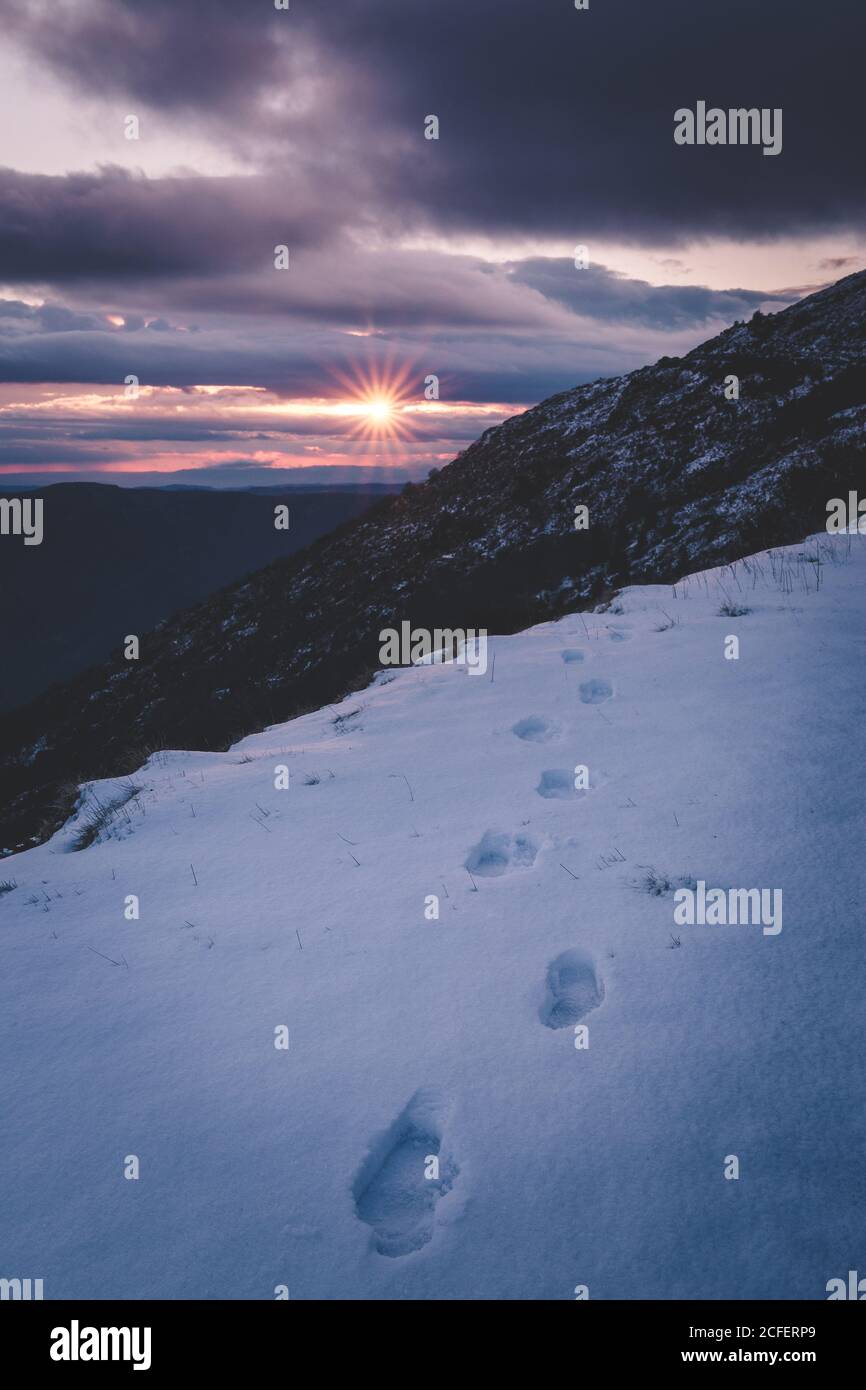 Sun over mountains hi-res stock photography and images - Alamy