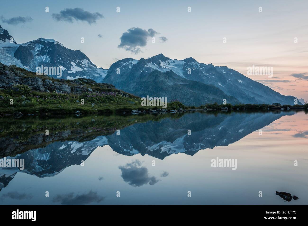 Serene lake reflecting snowy hi-res stock photography and images - Alamy