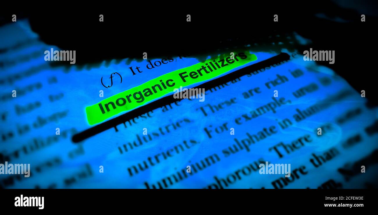 Inorganic Fertilizer word highlighted with closeup view on book word ...