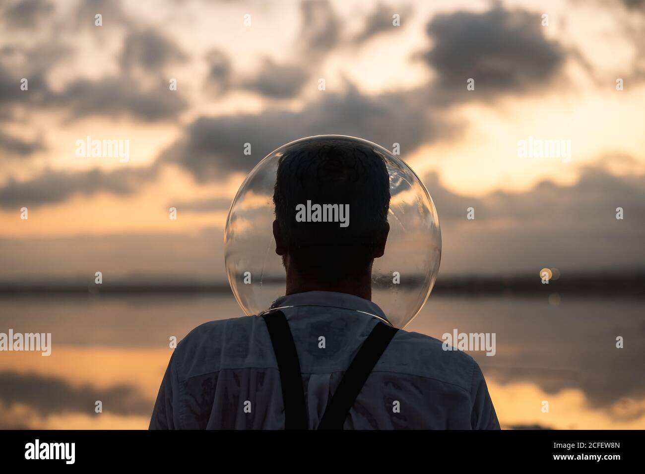 Man standing still from behind hi-res stock photography and images - Alamy