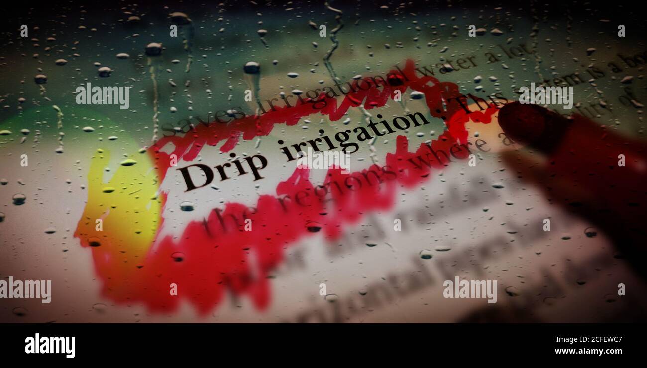 Drip irrigation word highlighted with closeup view on book word ...
