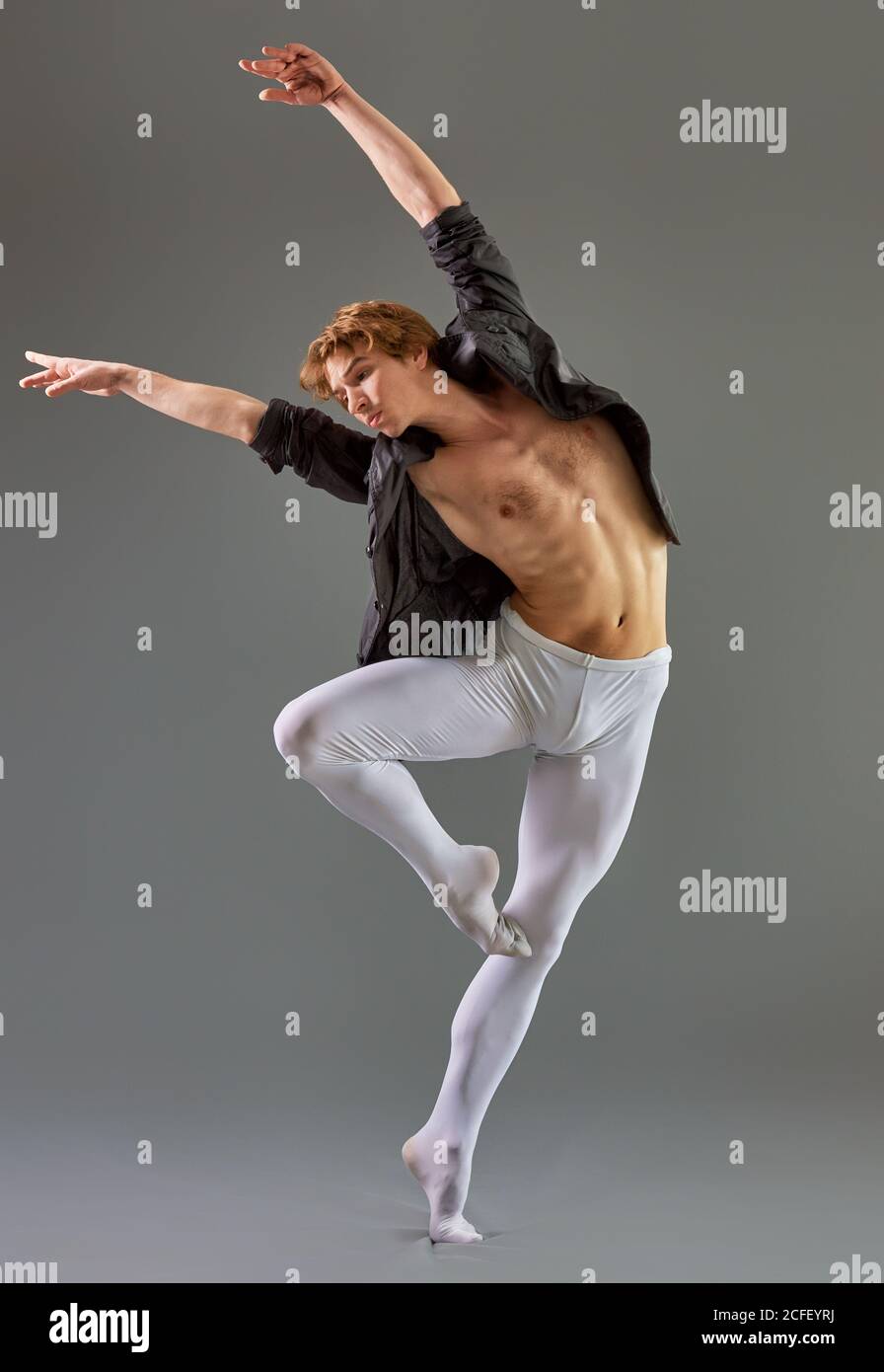 modern ballet dancer on grey background Stock Photo - Alamy