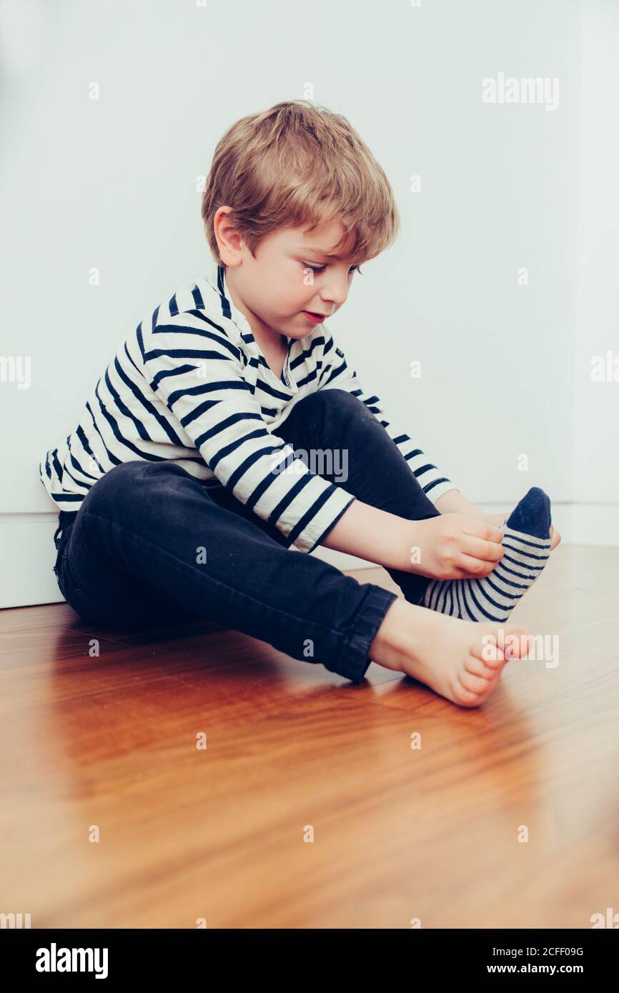 Boy kid socks hi-res stock photography and images - Alamy