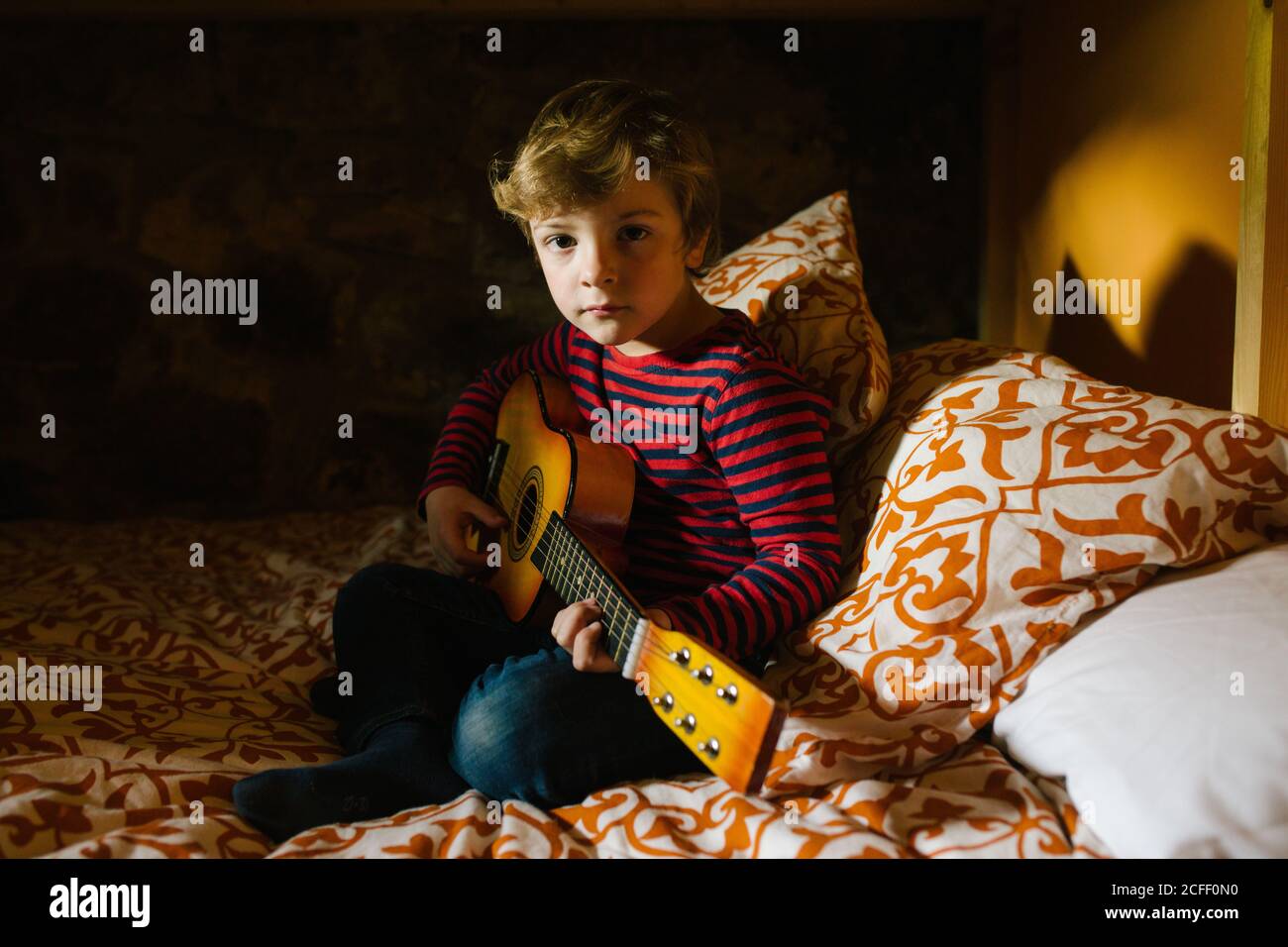 Child sitting chilling hi-res stock photography and images - Alamy