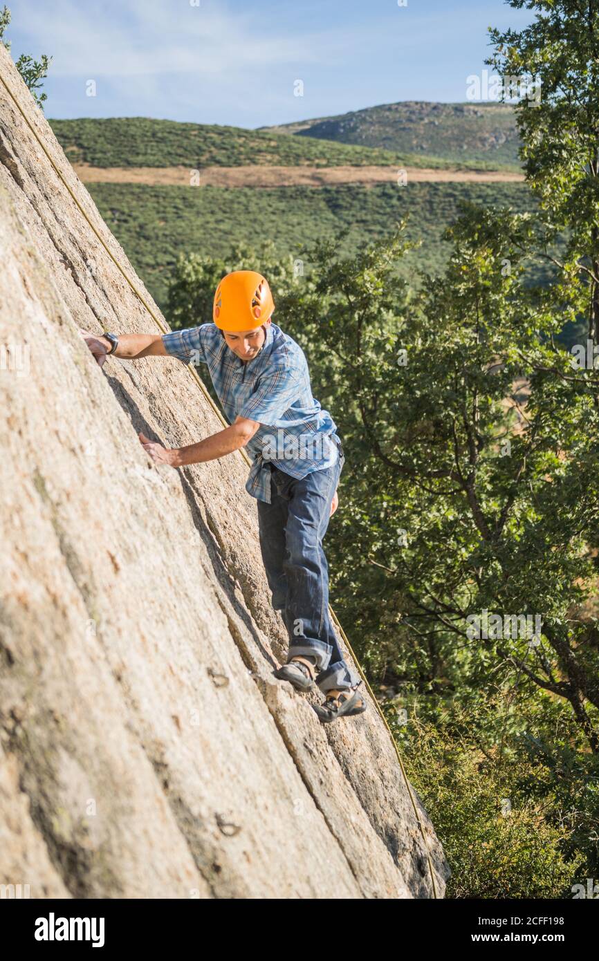 Top view of free climber climbing in nature Stock Photo - Alamy