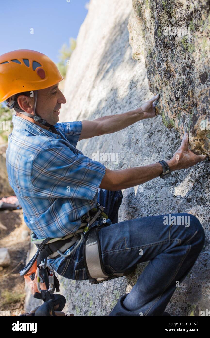 Top view of free climber climbing in nature Stock Photo - Alamy